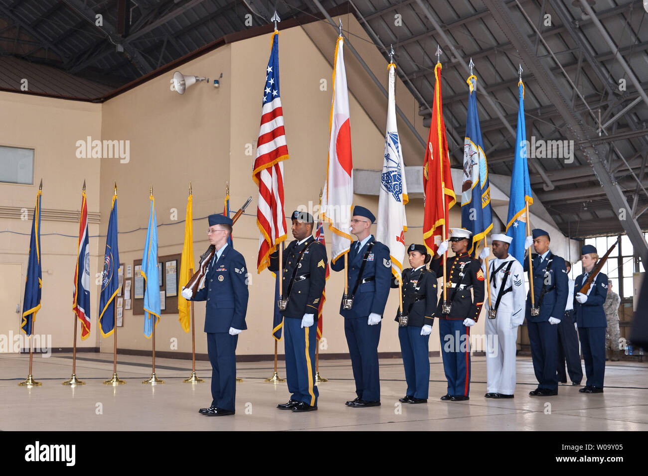 Color guards walk during a change of command ceremony at Yokota air ...