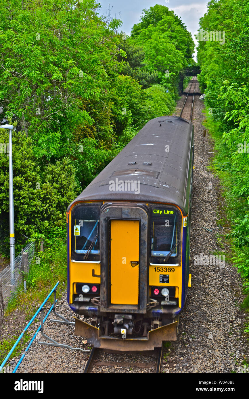 A single coach train departs Rhiwbina railway station heading towards ...