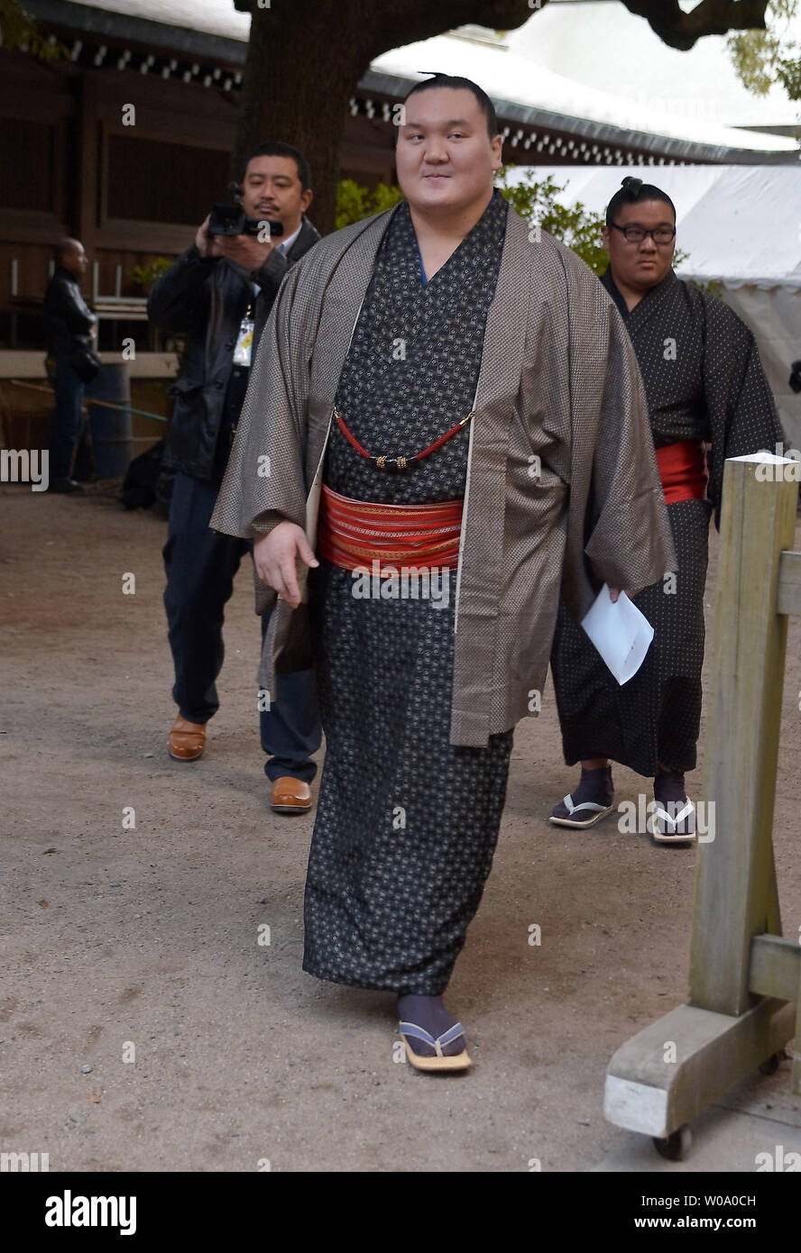 Mongolian grand sumo champion Yokozuna Hakuho leaves after performing ...