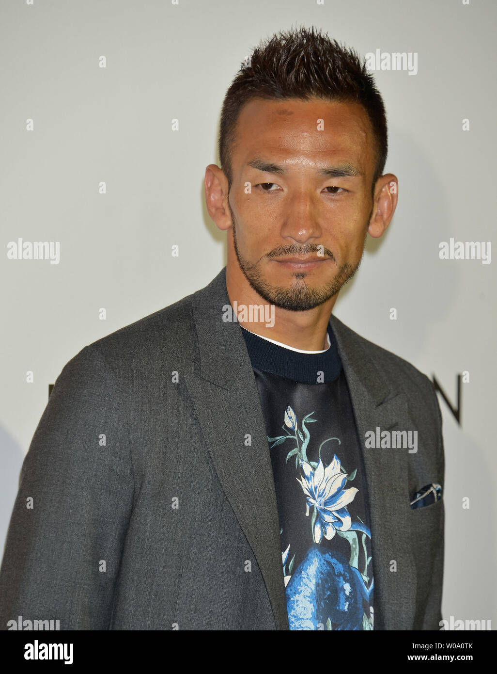 Hidetoshi Nakata attends a reception of Louis Vuitton's art exhibition ...