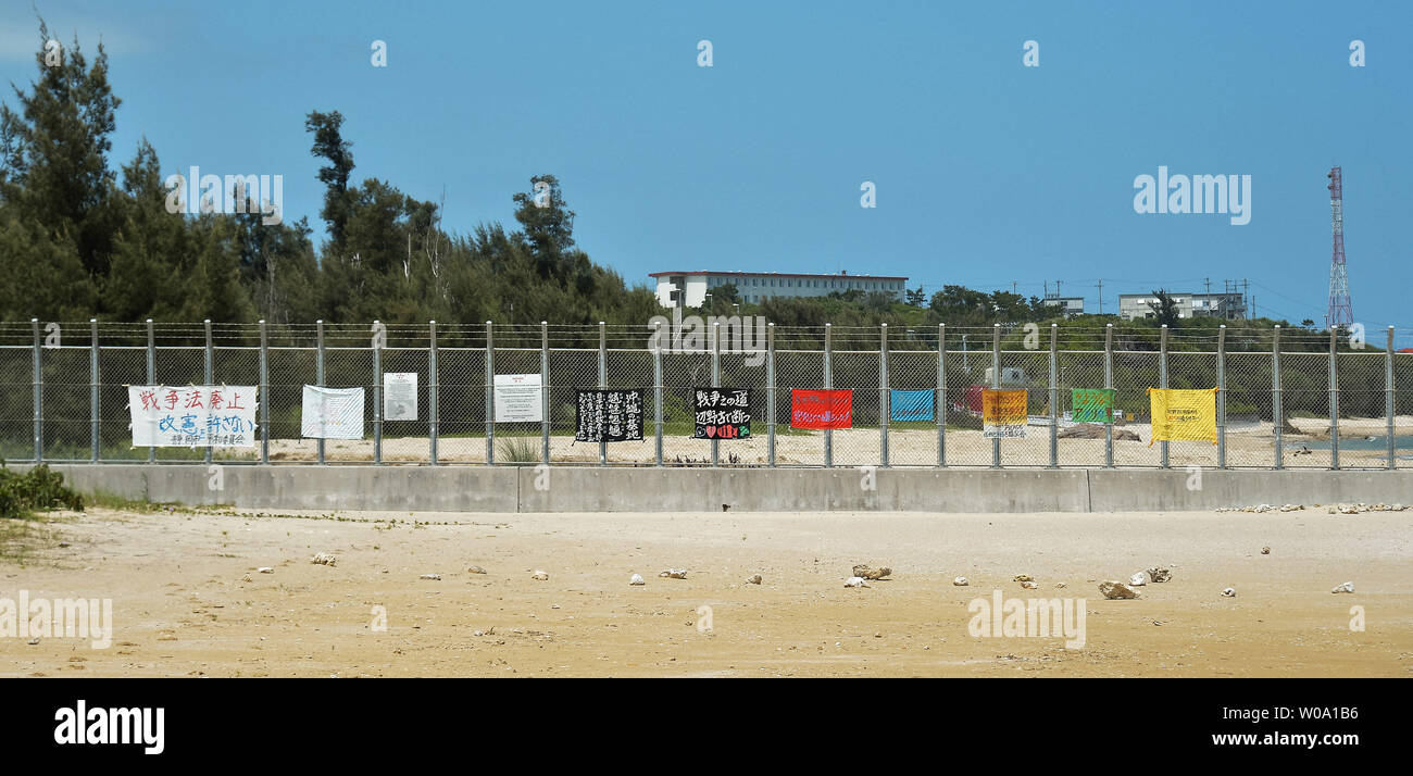 Anti Base banners by the fence of Camp Schwab of U.S. Marine Corps are ...