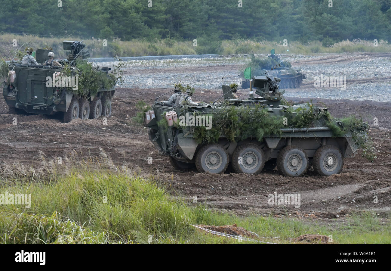 U.S Army Stryker and Japan Ground Self-Defense Force battle tank Type ...
