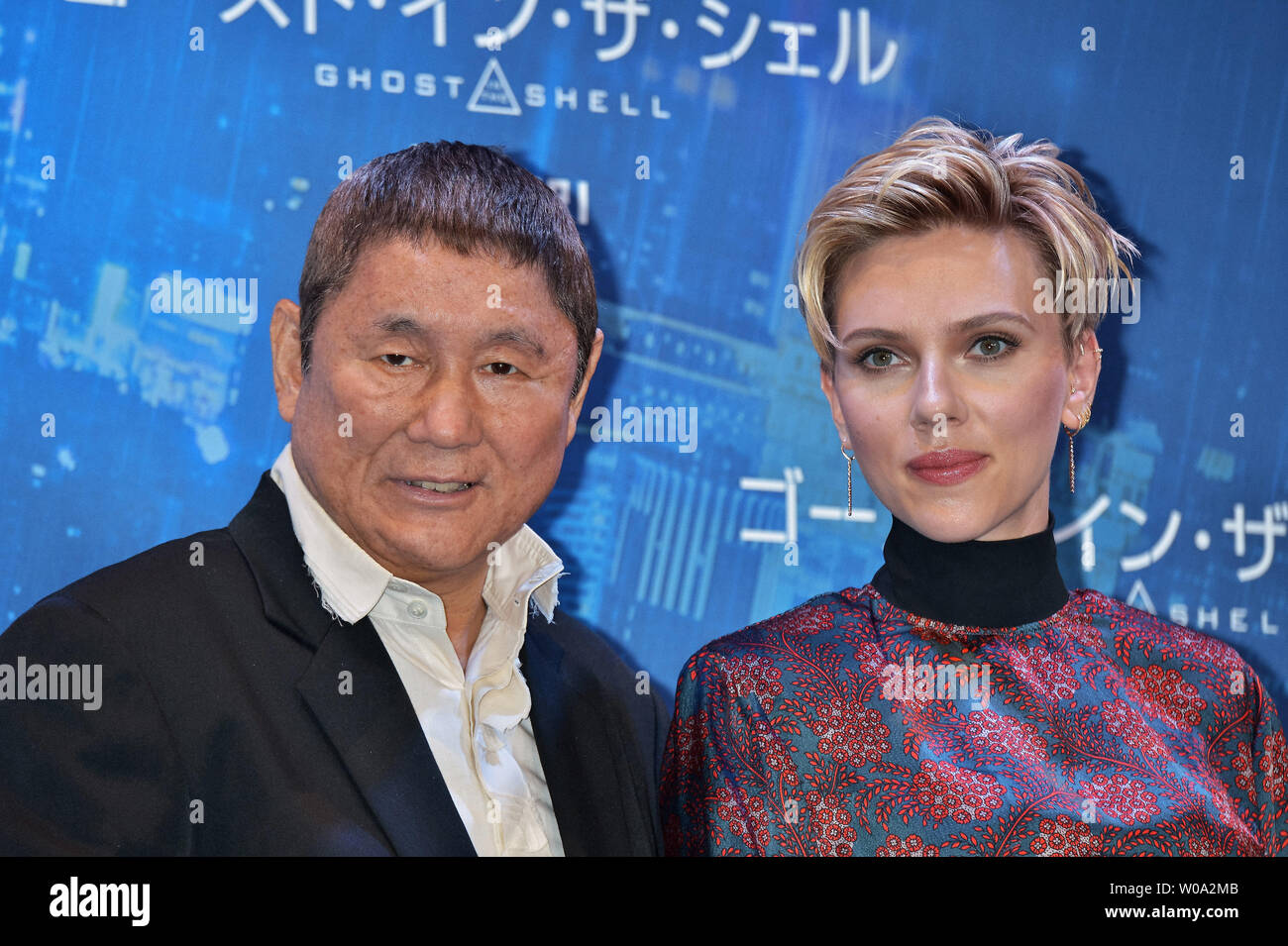 Japanese actor Takeshi Kitano(L) and actress Scarlett Johansson attend ...