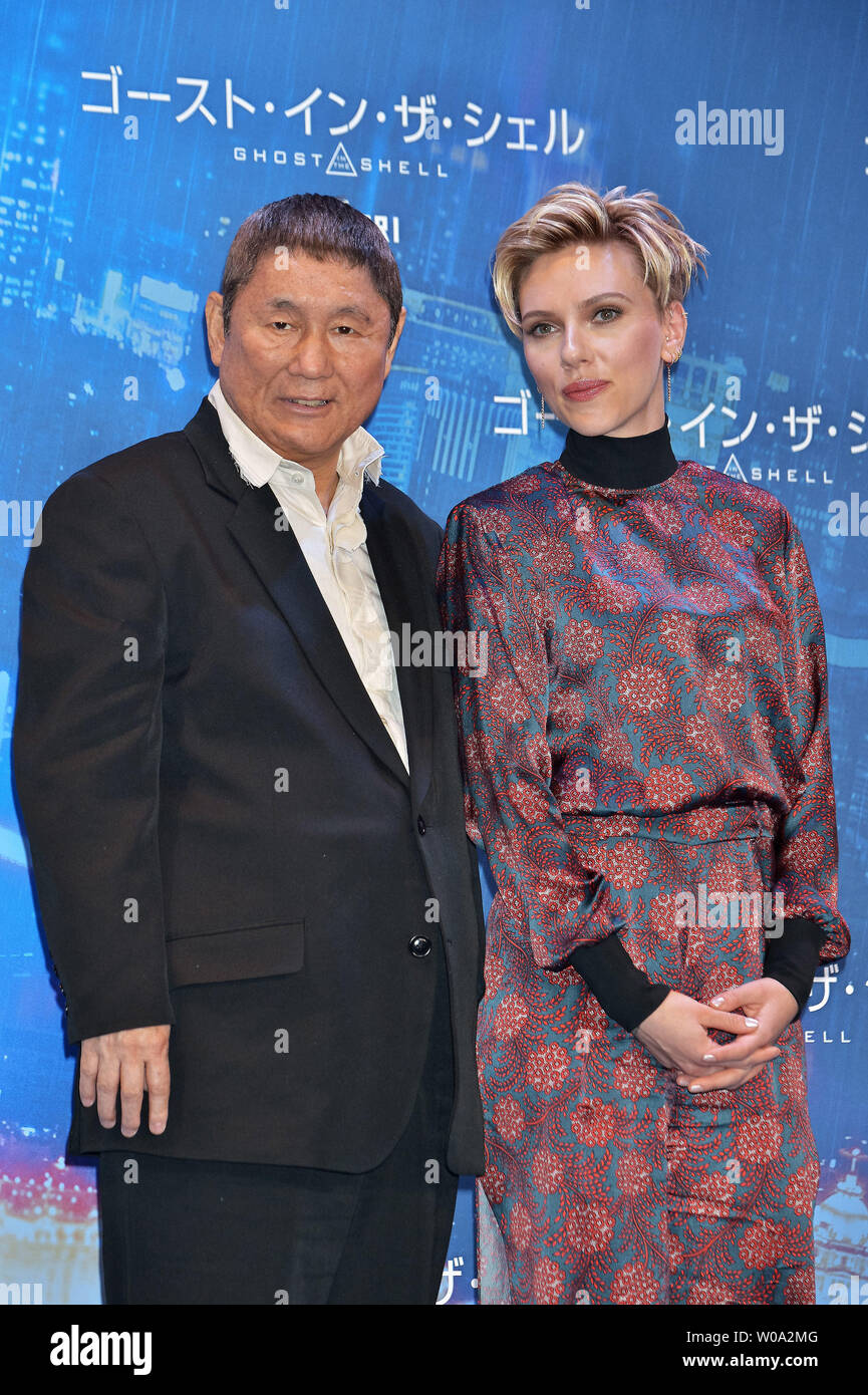Japanese actor Takeshi Kitano(L) and actress Scarlett Johansson attend ...
