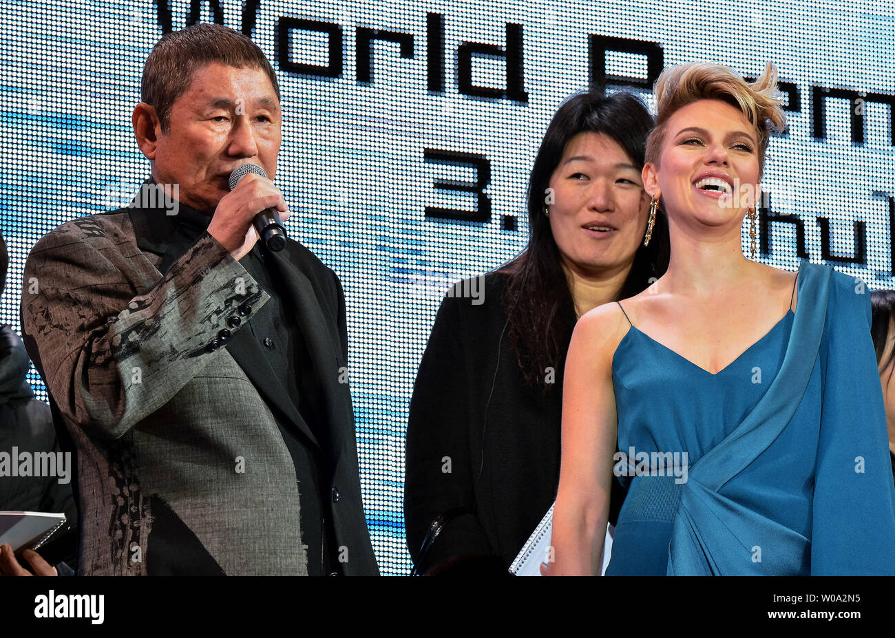 Japanese actor Takeshi Kitano(L) and actress Scarlett Johansson attend ...