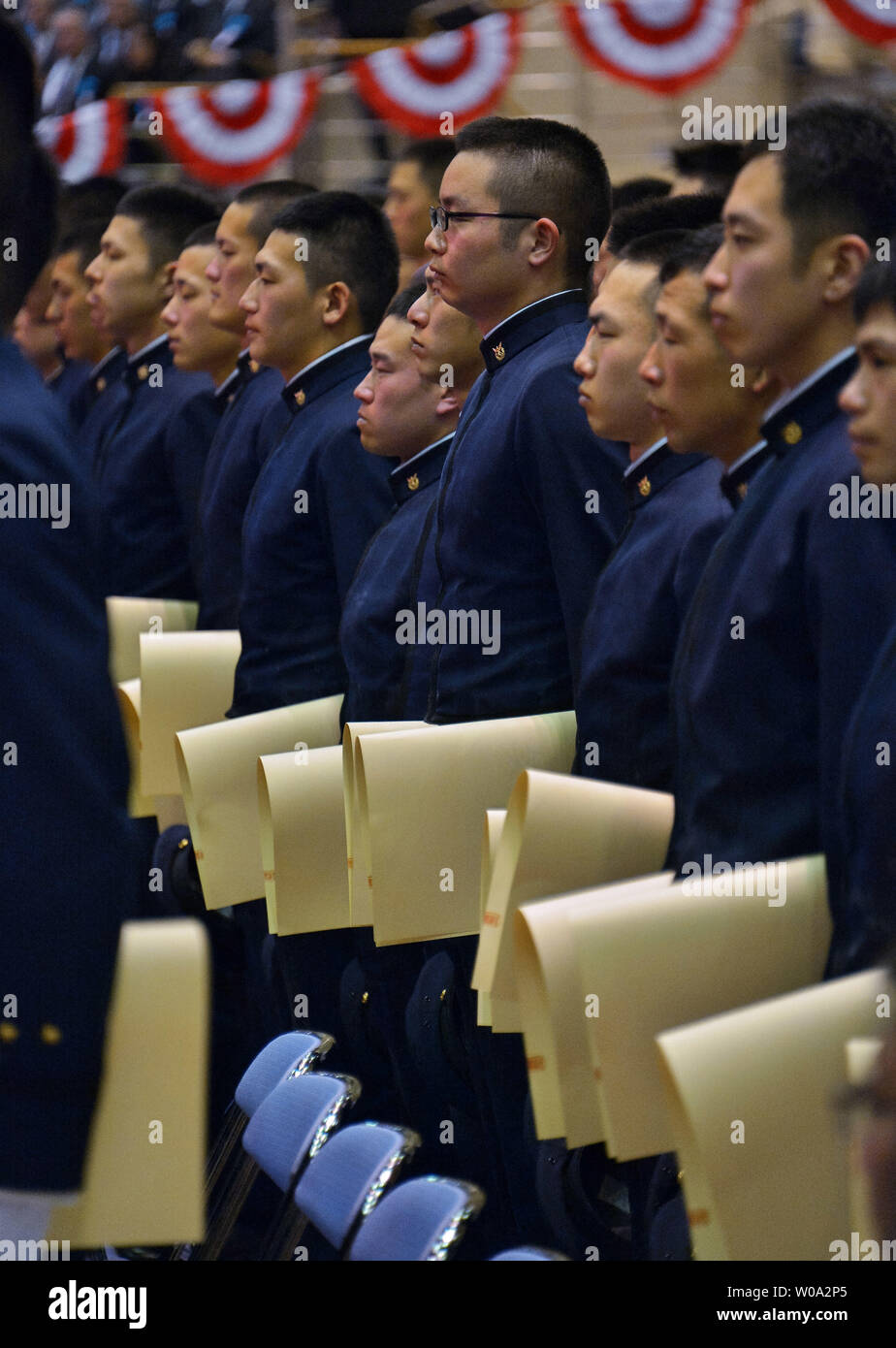 Graduates of Japan's National Defense Academy attend the graduation ...