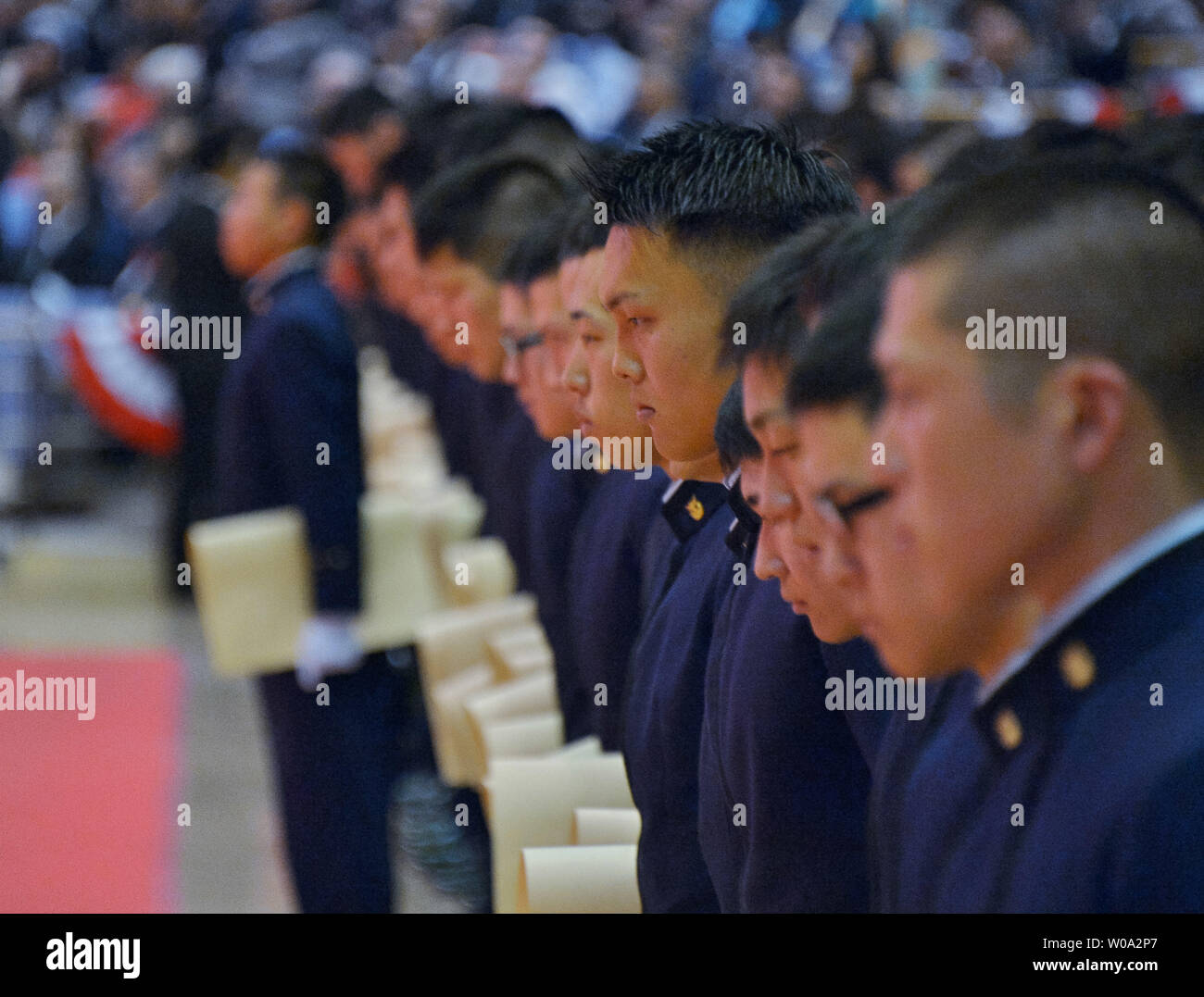 Graduates of Japan's National Defense Academy attend the graduation ...
