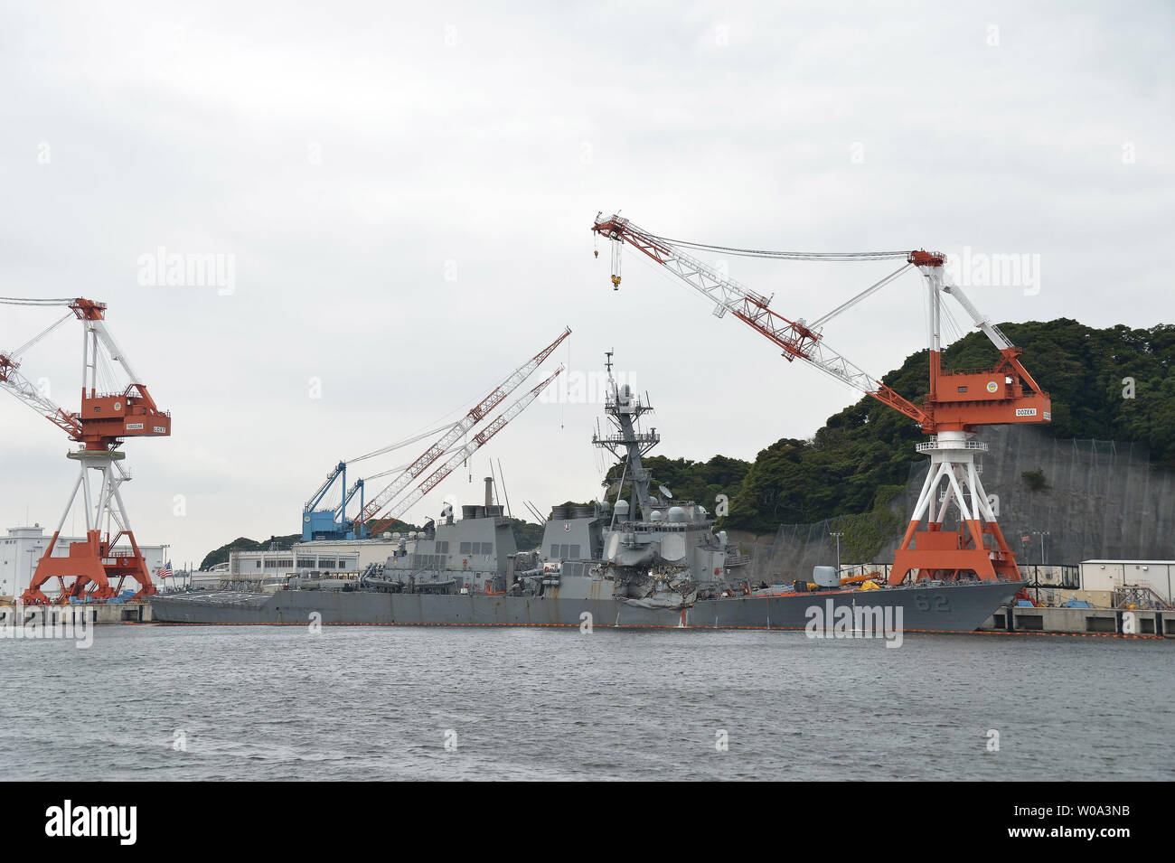 The damaged part of the USS Fitzgerald is seen at the Fleet Activities ...