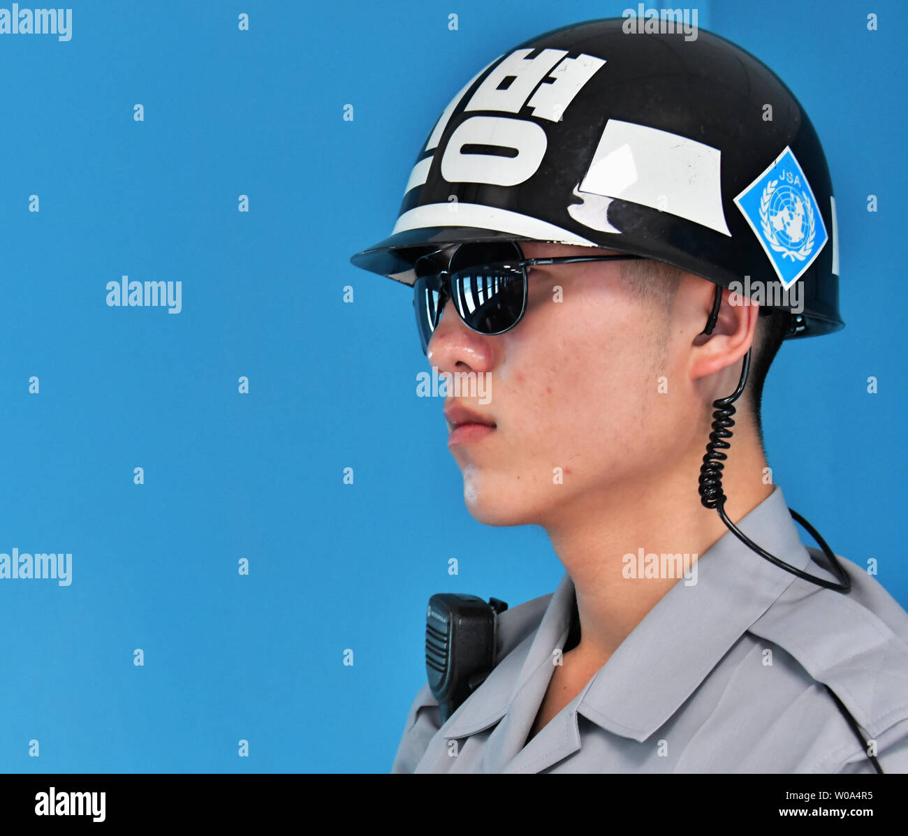 A South Korean soldier stands guard in a conference room in the United ...
