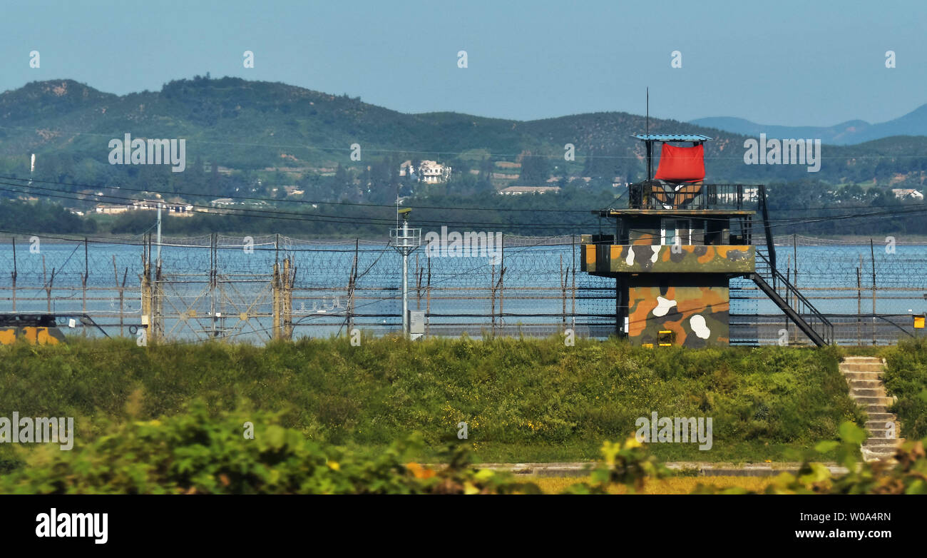 The village of Kaepung, North Korea is seen across the Imjin river and ...