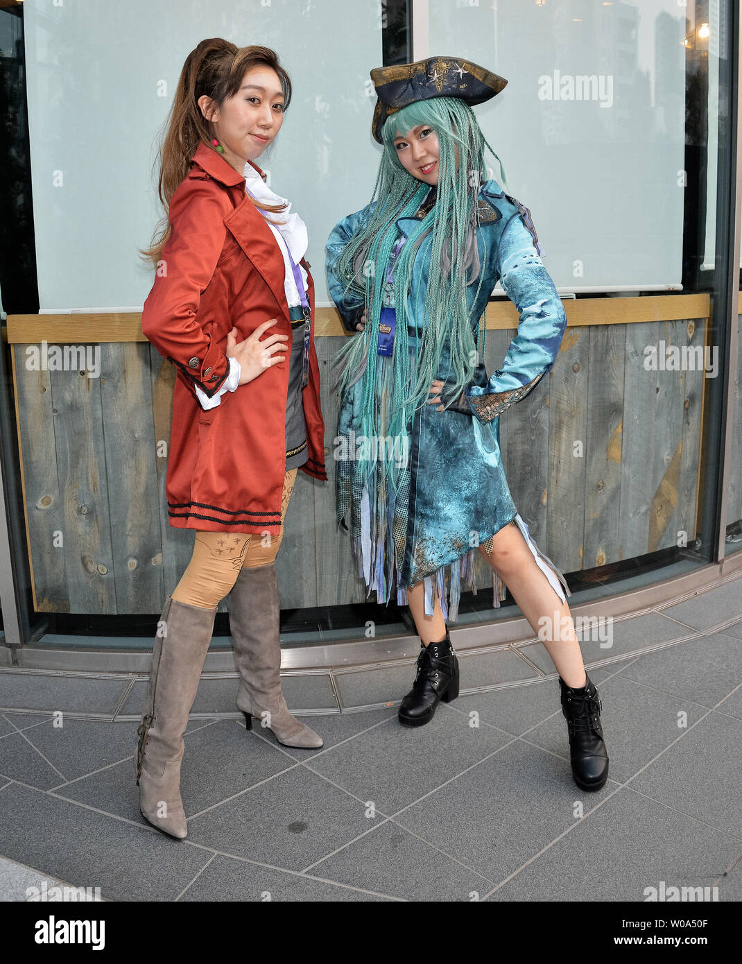 Japanese fans wear costumes during the event for Disney Channel's ...