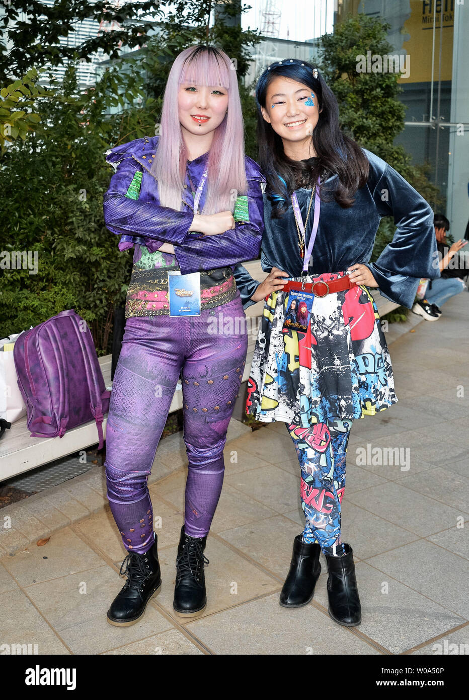 Japanese fans wear costumes during the event for Disney Channel's ...