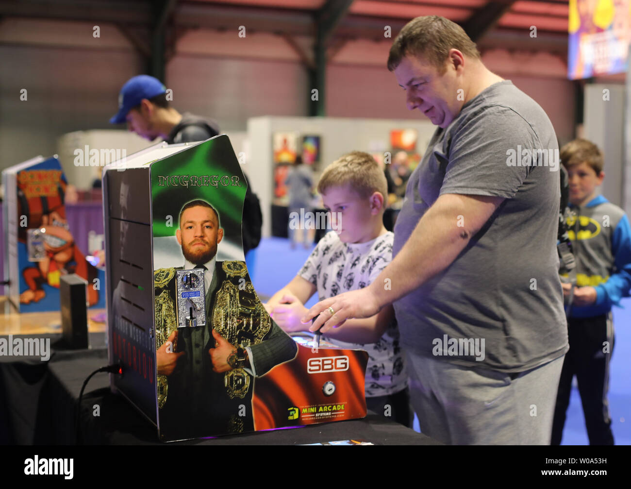 People play a Conor McGregor themed arcade machine made by Aidan ...