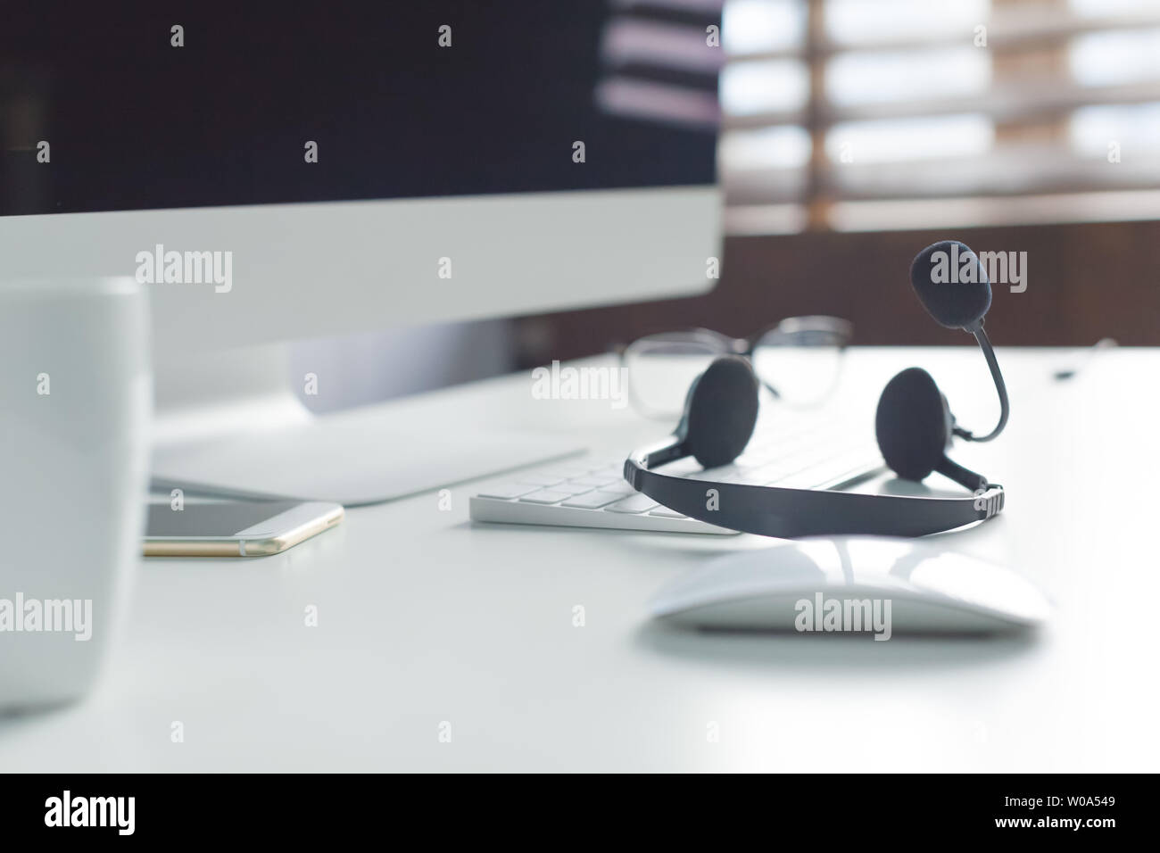 laptop computer with headset Stock Photo - Alamy