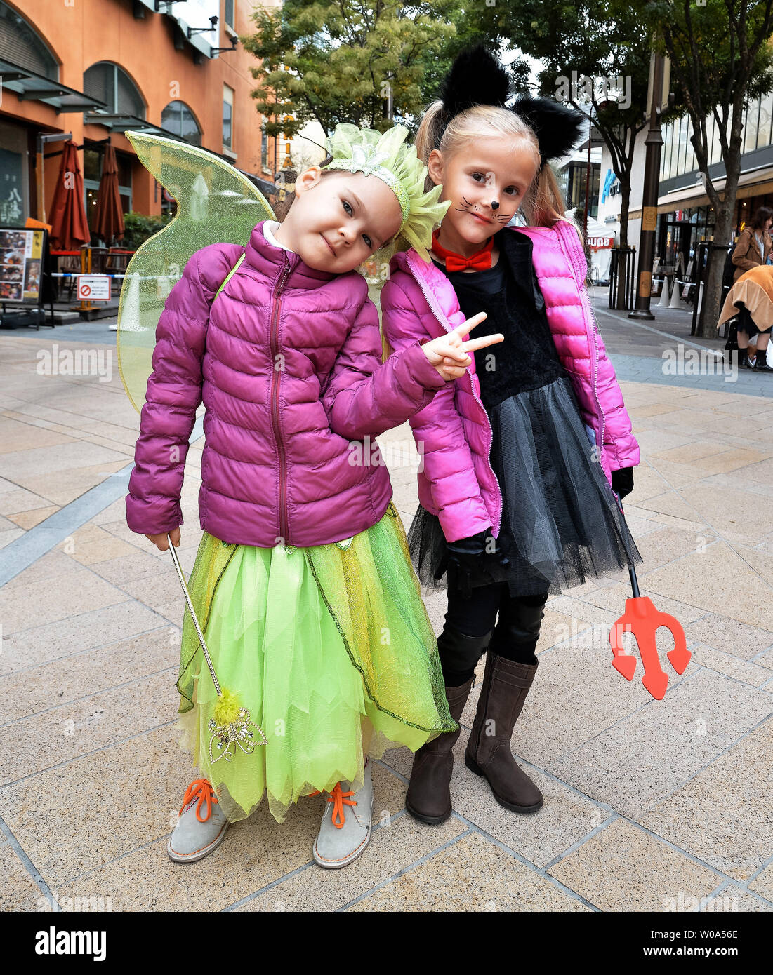 A participant poses for camera during a Halloween parade in Kawasaki ...