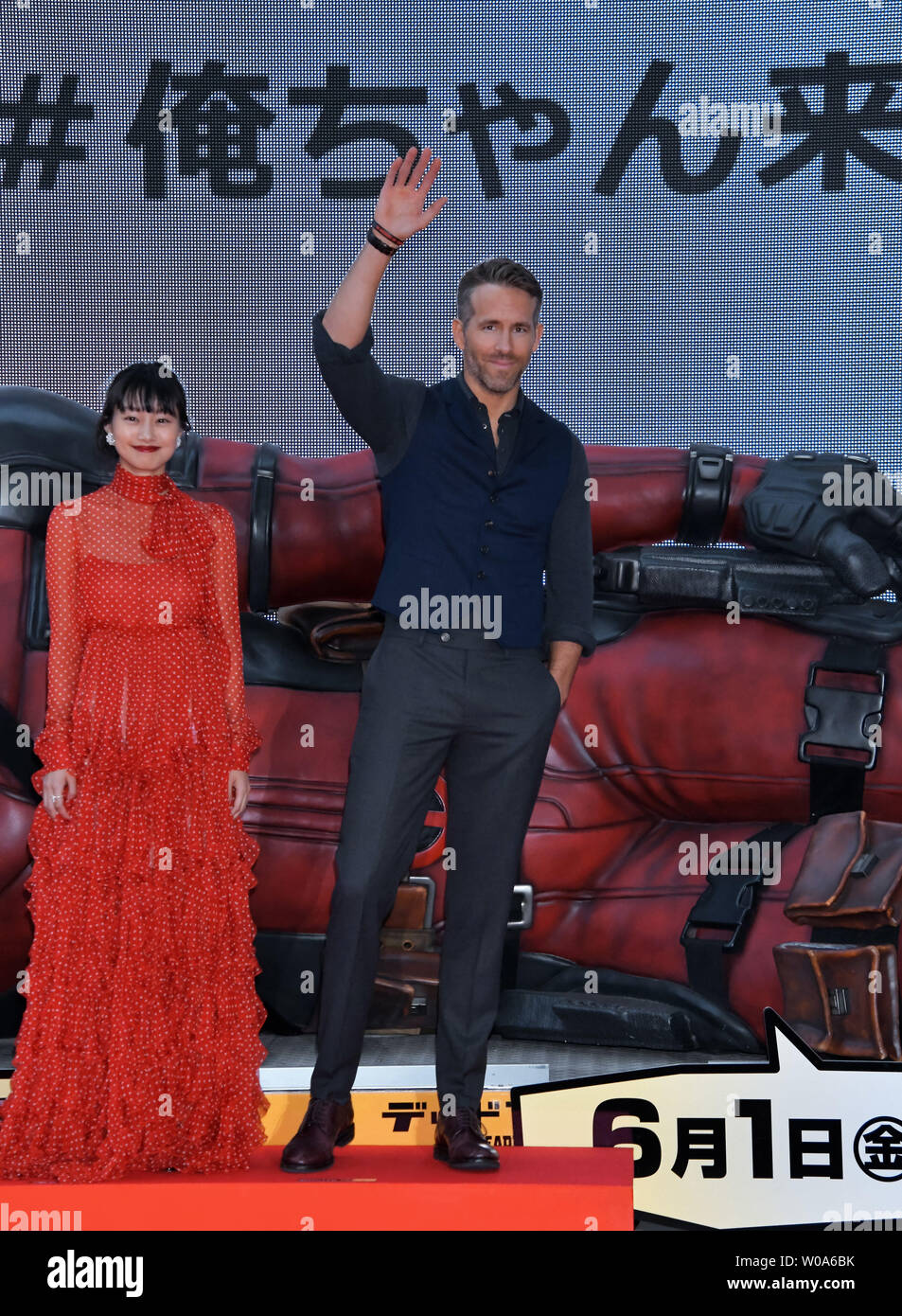 Actor Ryan Reynolds(R) and actress Shioli Kutsuna attend the Japan ...