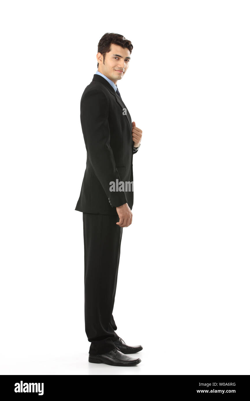 Portrait of a businessman standing Stock Photo - Alamy