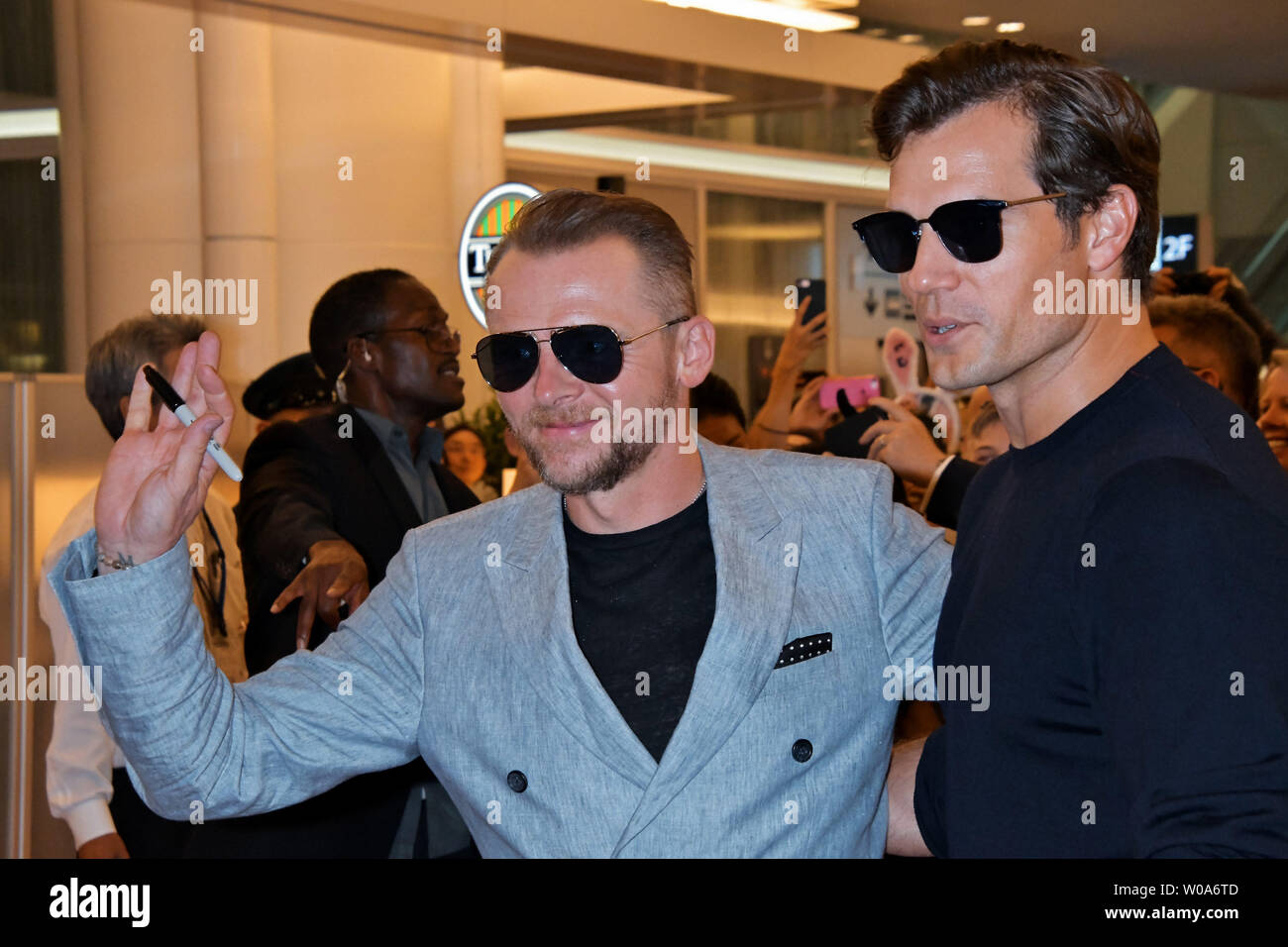 Actor Henry Cavill(R) and Simon Pegg arrive at the Tokyo International ...