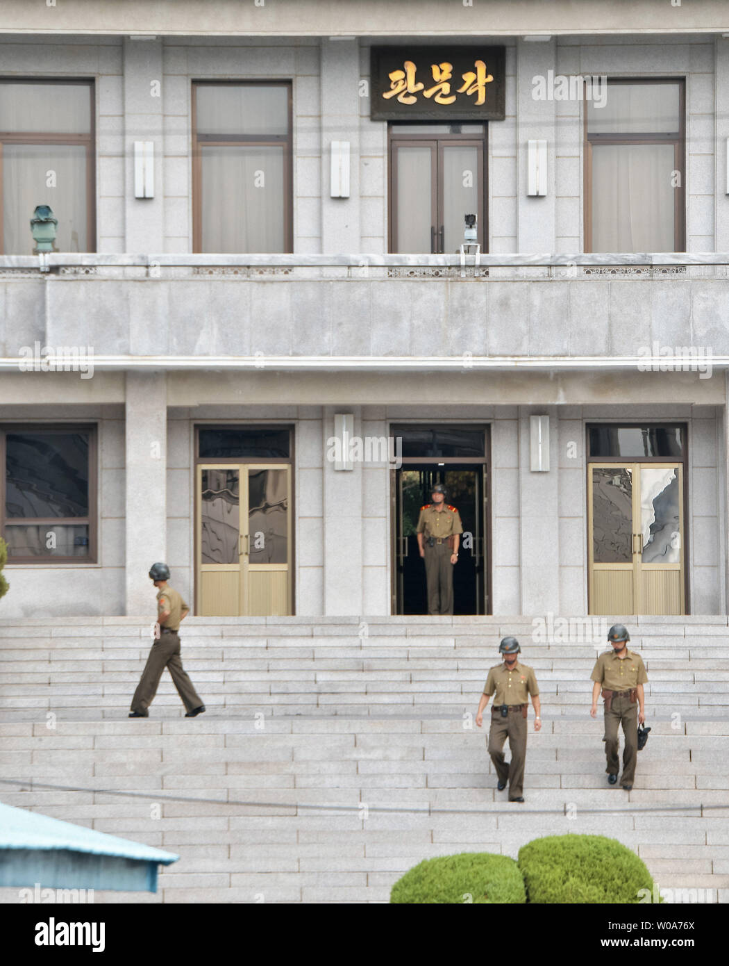 North Korean soldiers walk at the joint security area (JSA) of ...