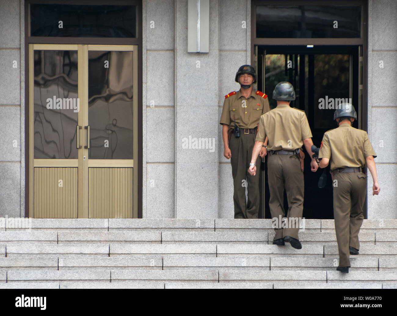 North Korean soldiers walk at the joint security area (JSA) of ...