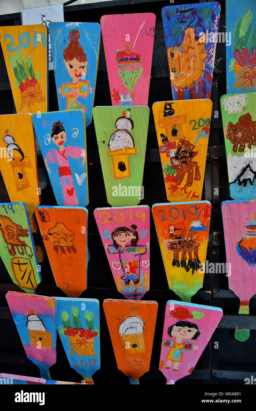 Battledore painted by Kindergartener are displayed on the opening day ...