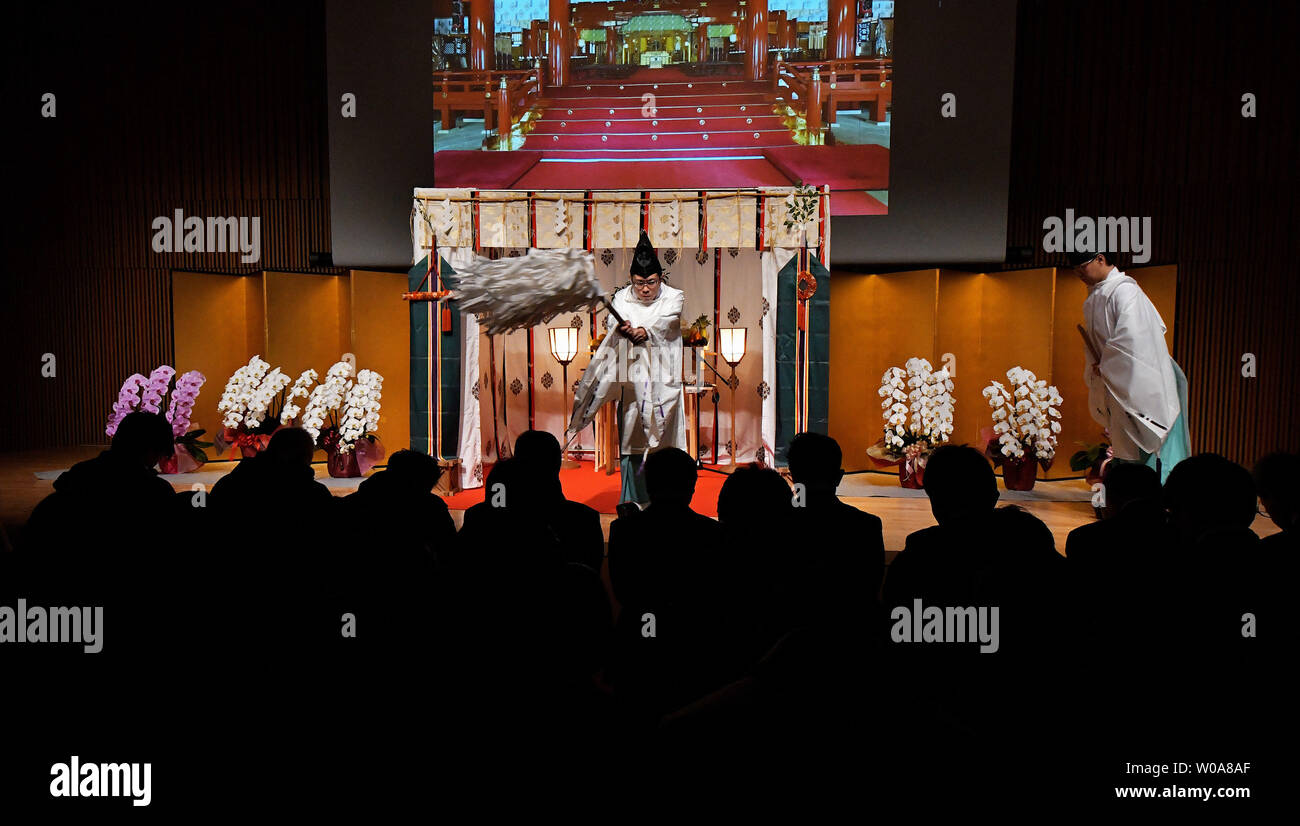 A Shinto priest performs the "Oharai" (ritual of purification) for ...