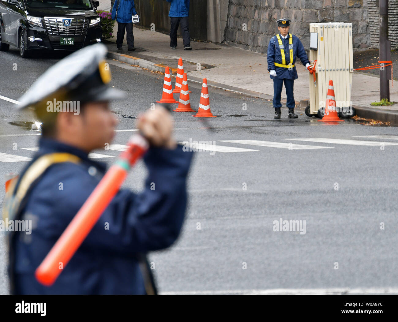 Member of Tokyo metropolitan police officer stand guard around the ...