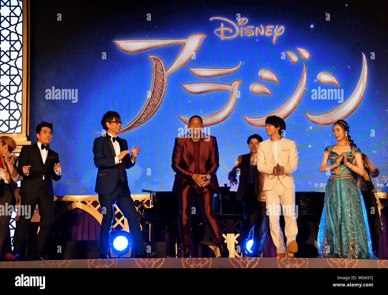 (L-R) Japanese actor Kazuki Kitamura, Koichi Yamadera, actor Will Smith ...