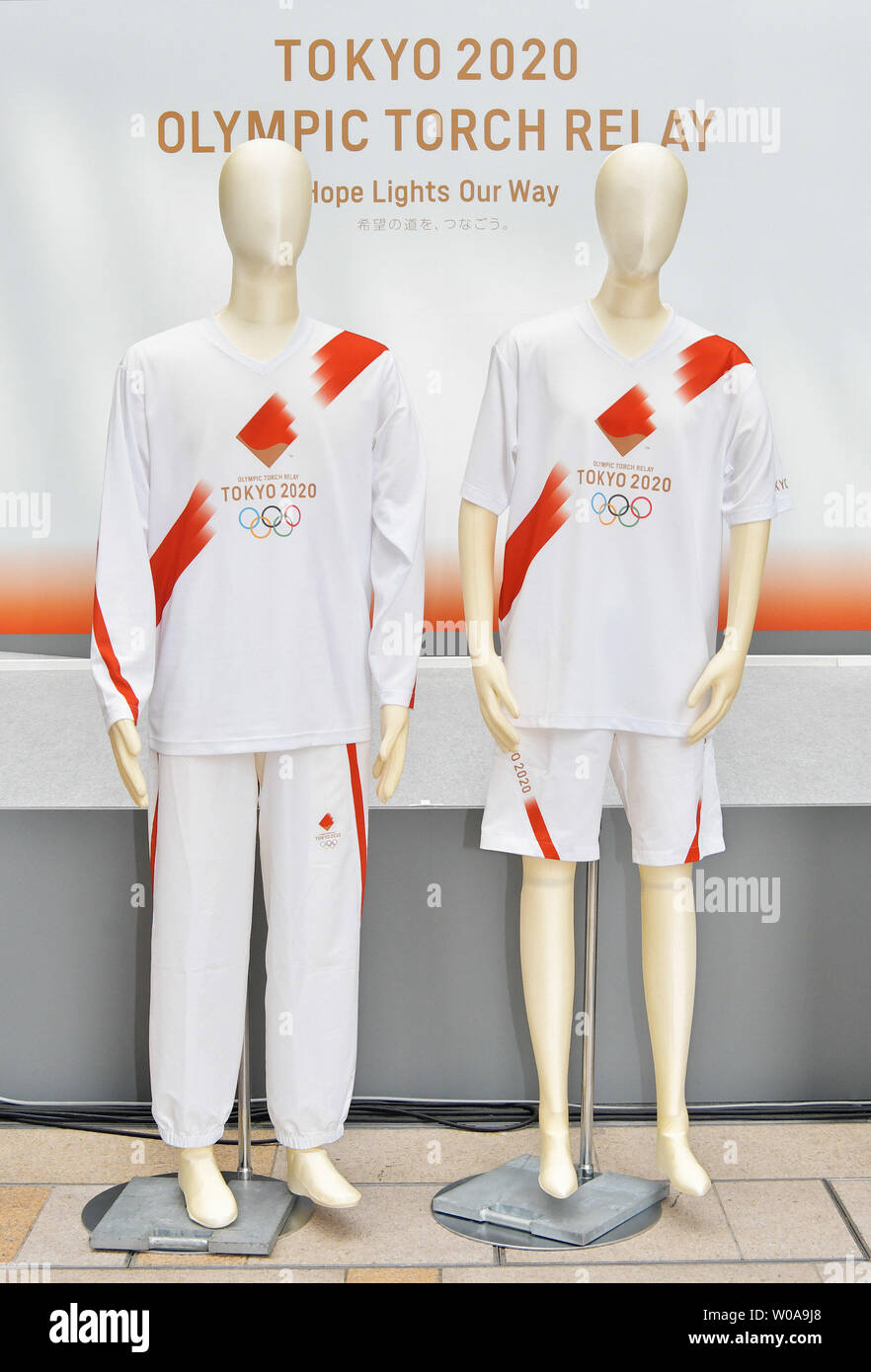 Torchbearer uniform are displayed at the torch relay event in Tokyo ...