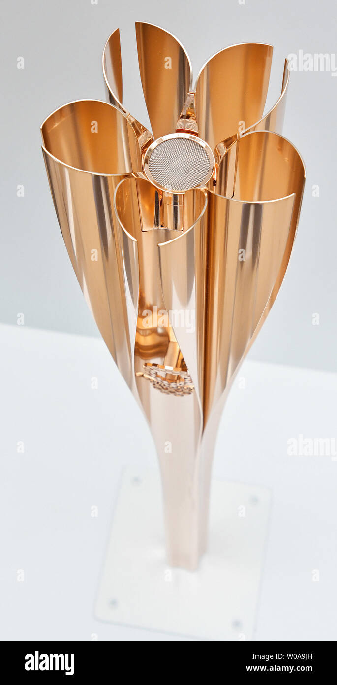 A torch of the Tokyo 2020 Olympic Games is displayed at the torch relay ...
