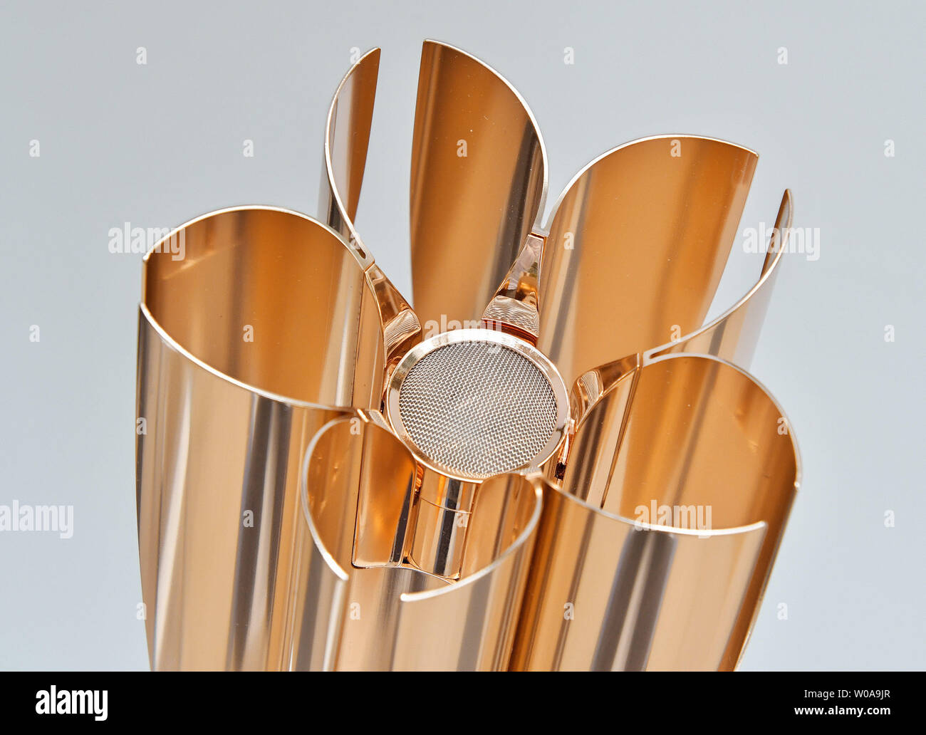 A torch of the Tokyo 2020 Olympic Games is displayed at the torch relay ...