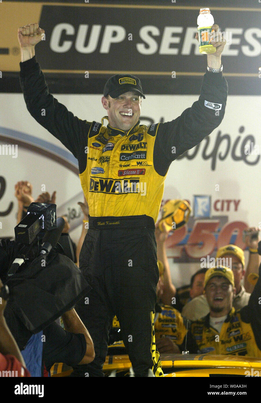 Matt Kenseth celebrates in victory lane after winning the Sharpie 500 ...