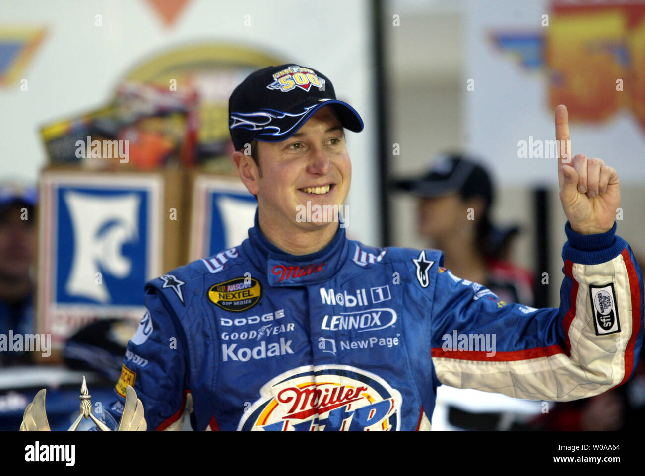 NASCAR driver Kurt Busch celebrates in Victory Lane after driving the ...
