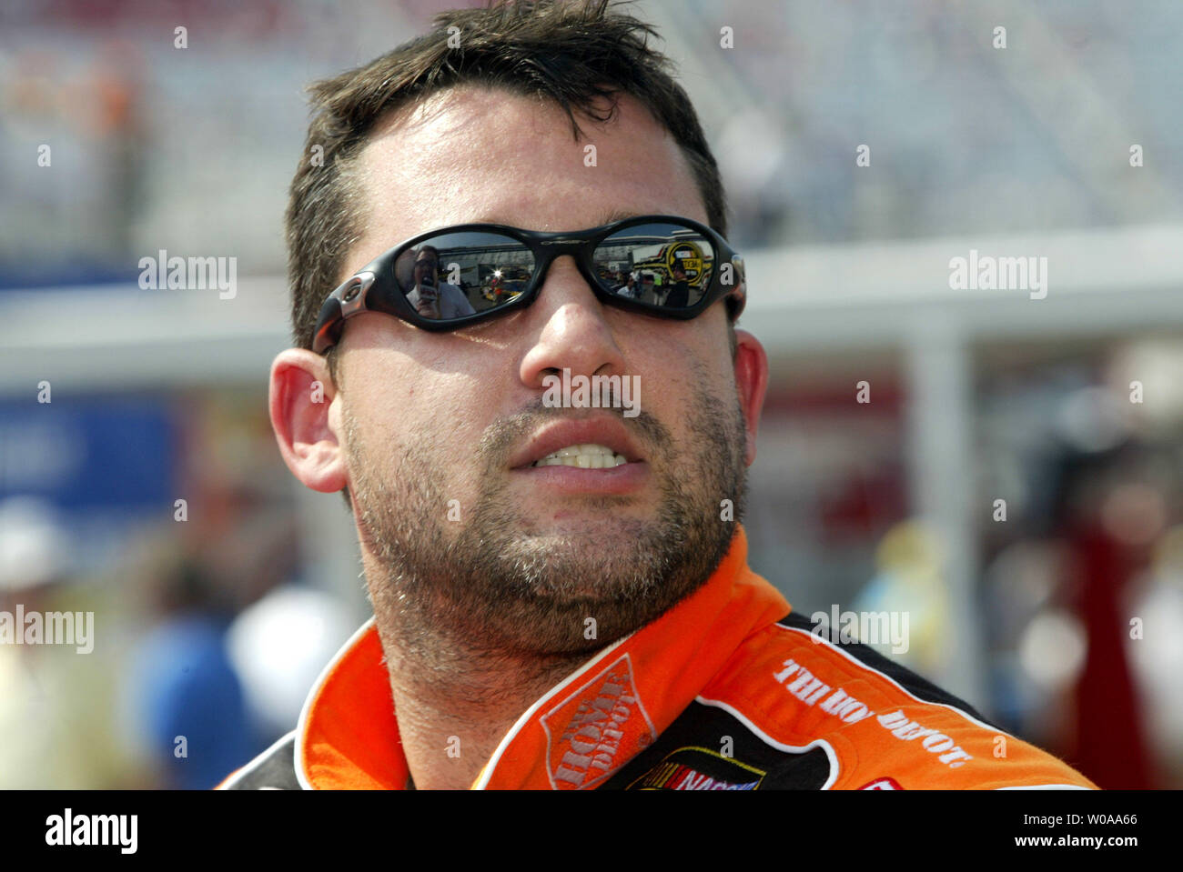 NASCAR race car driver Tony Stewart watches other cars during ...