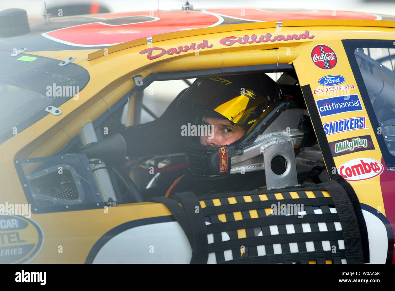 NASCAR race car driver David Gilliland sits in his #38 M&M's Ford ...