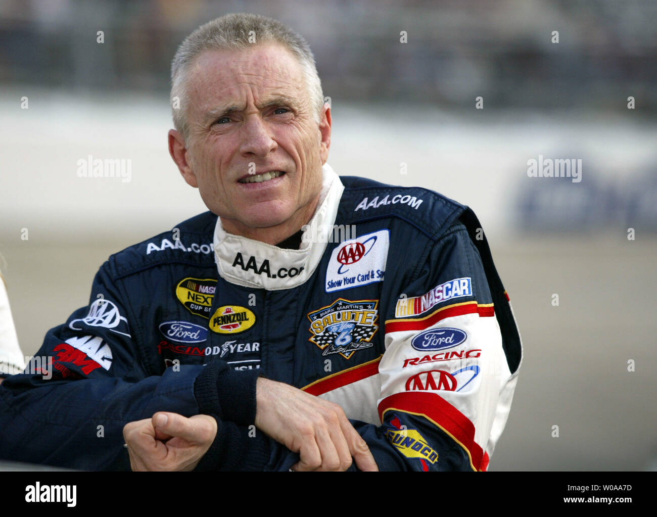 Nascar driver Mark Martin stands on pit road before the Sharpie 500 ...