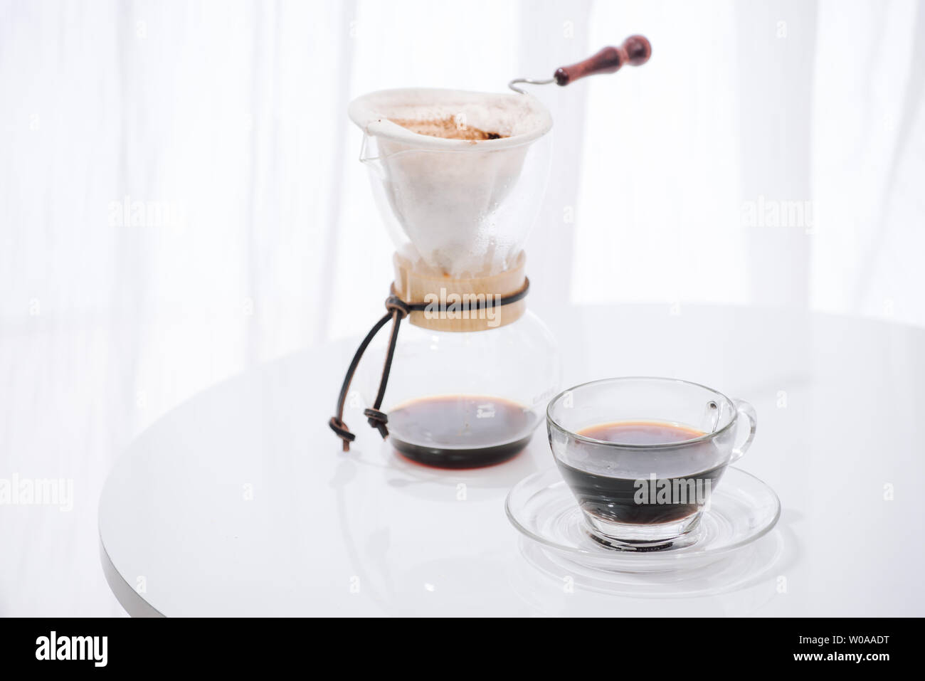 Pour over drip process coffee in retro filter effect with copy space ...