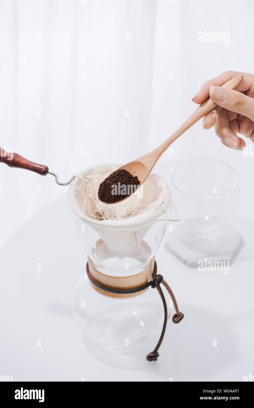 Man spills coffee powder to Drip Coffee Stock Photo - Alamy