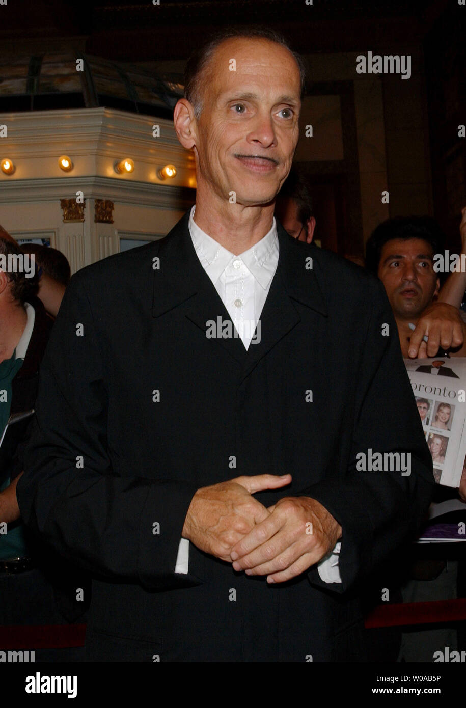 Director John Waters poses for photographers on the red carpet before ...