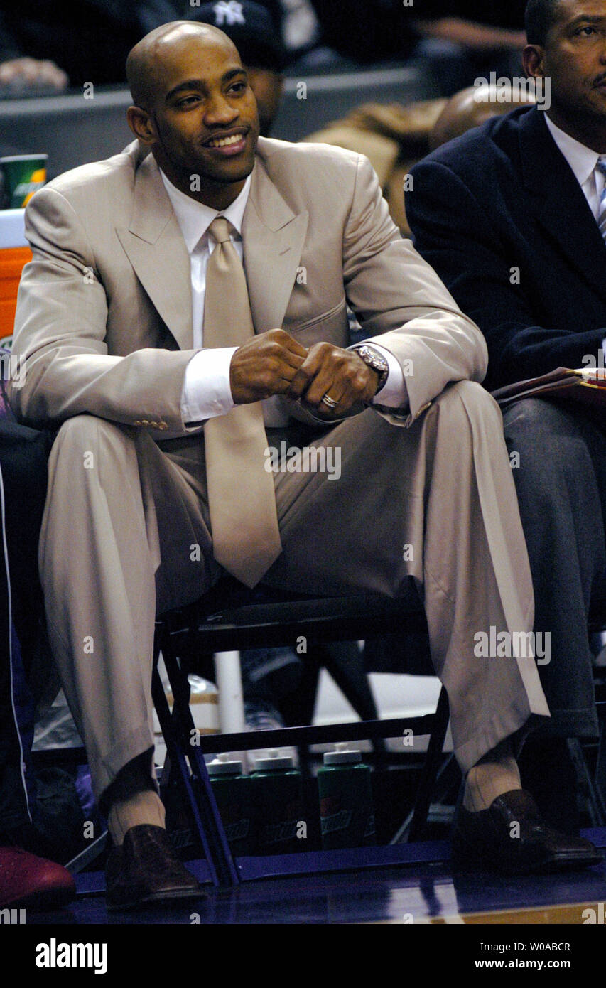 Toronto Raptors' Vince Carter sat out the game with a strained left ...