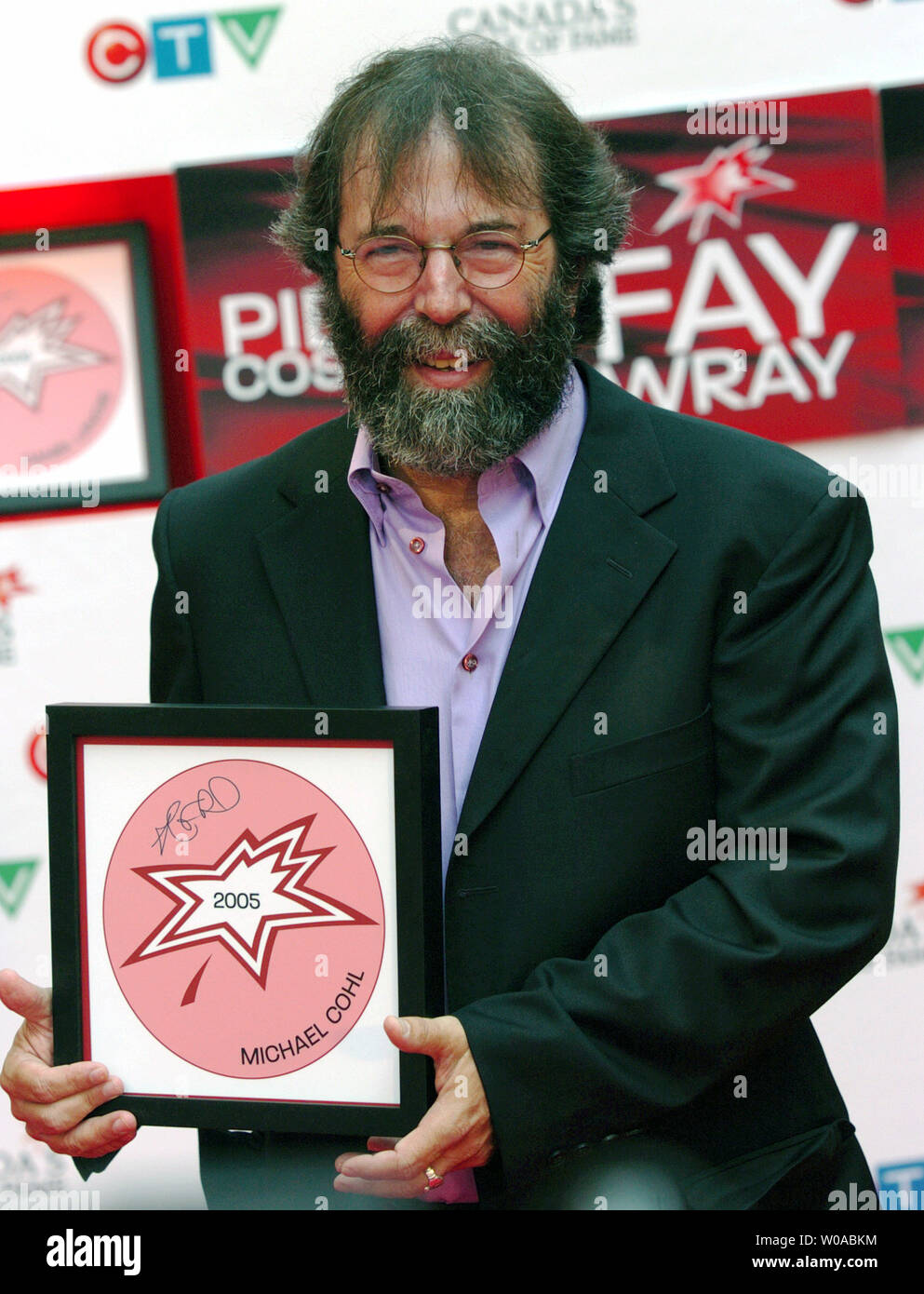 Concert promoter Michael Cohl shows his star on the red carpet in front ...