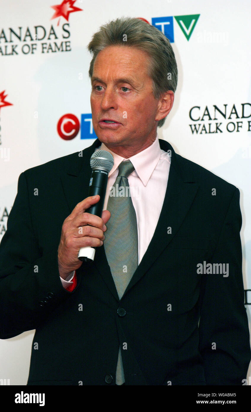 Michael Douglas answers questions from reporters in the Media Center at ...