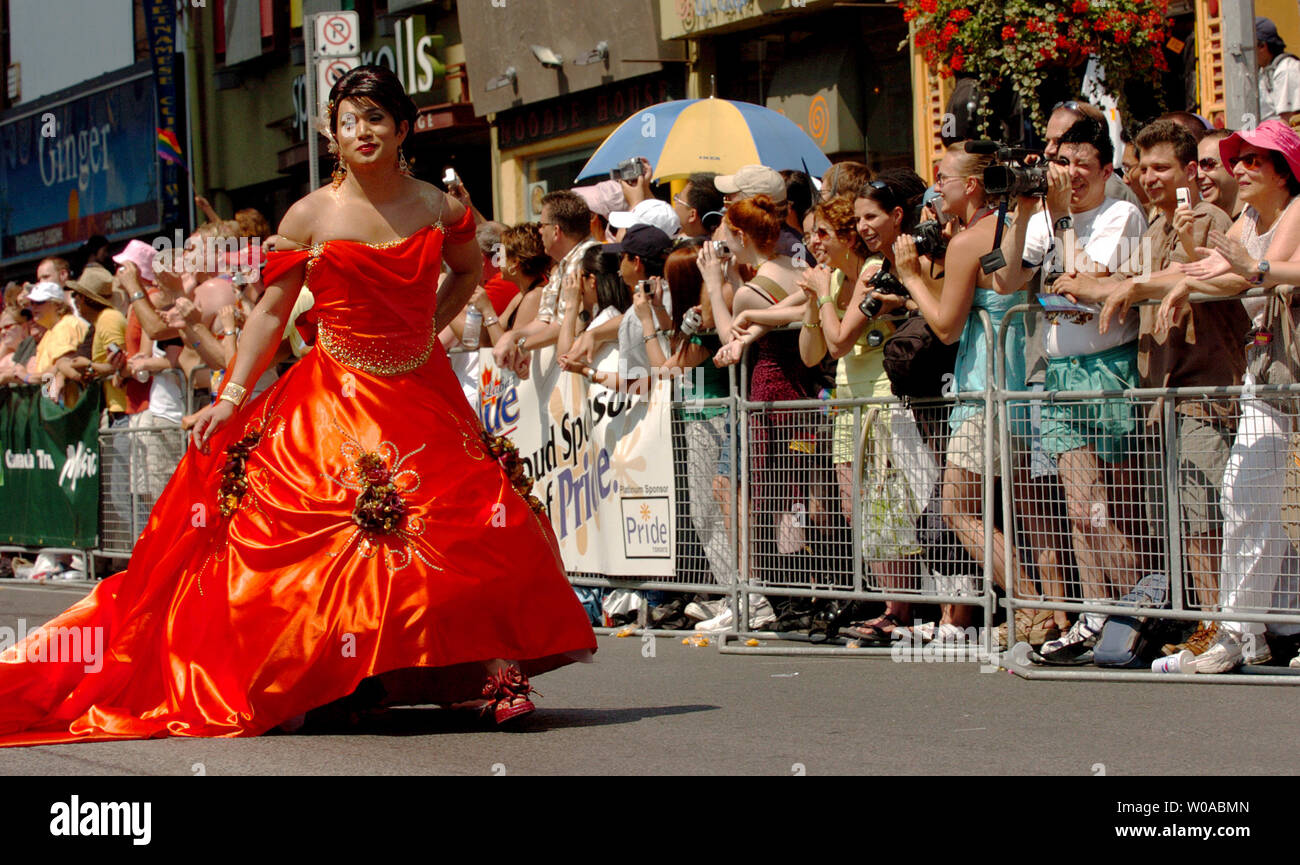 A Drag Queen Parades His Finery On Yonge Street In Downtown Toronto Canada Before An