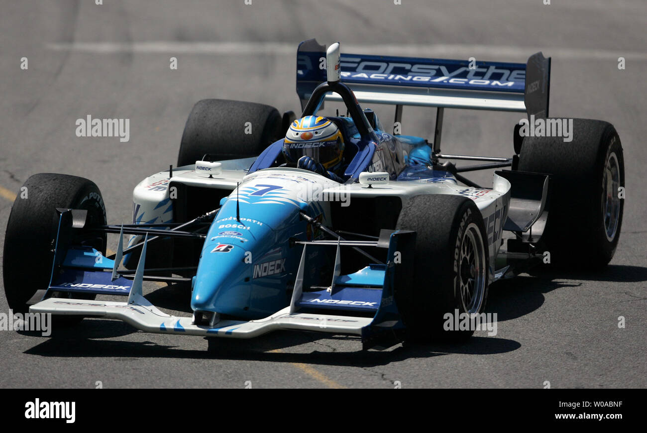 Mexican champ car driver Mario Dominguez takes the first turn in the ...