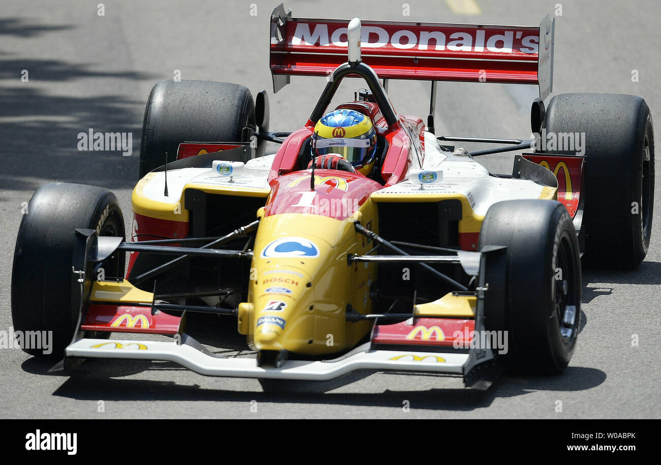 French champ car driver Sebastien Bourdais takes turn one in the second ...