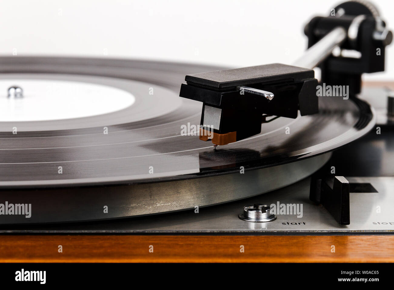 Close up of turntable needle on a vinyl record. Turntable playing vinyl ...