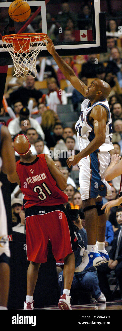 An airborne Michael Ruffin of the Washington Wizards and Toronto ...