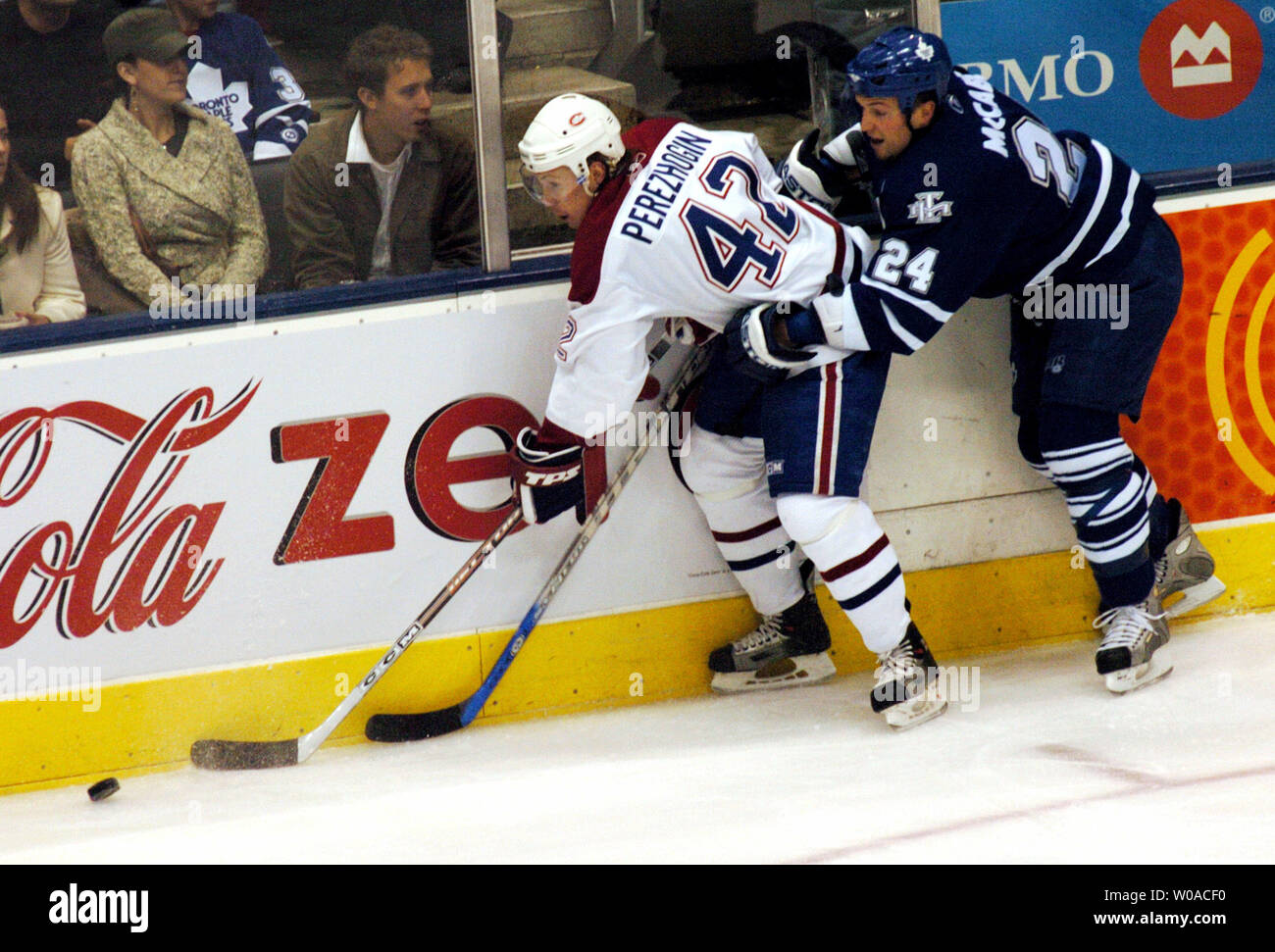 Montreal Canadiens' Alexander Perezhogin and Toronto Maple Leafs' Bryan ...