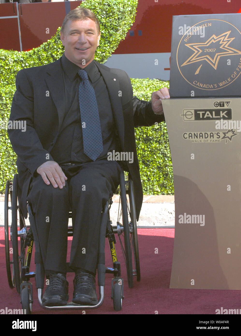 Athlete and motivational activist Rick Hansen shows off his newly ...