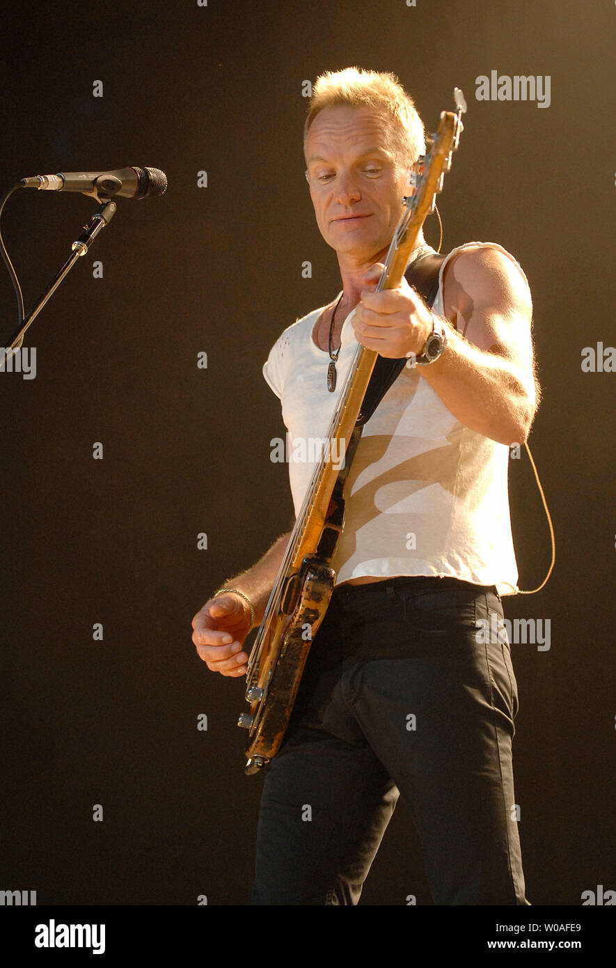 Police frontman and bassist Sting performs a song onstage in the first ...